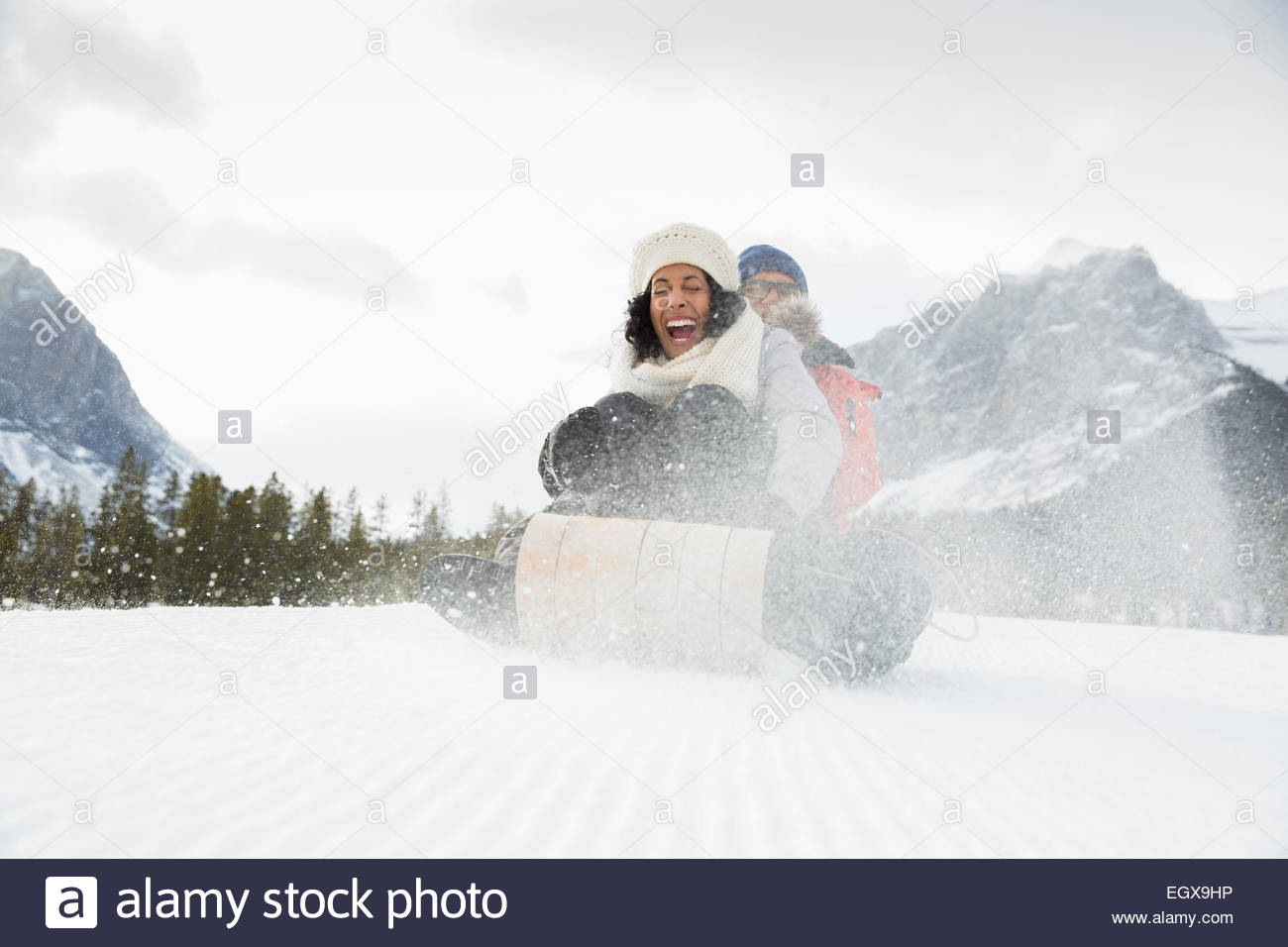 Couple Sledding Stock Photos & Couple Sledding Stock Images - Alamy