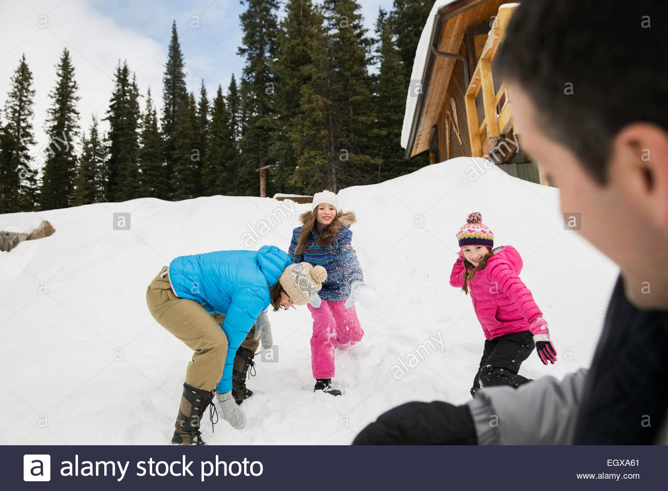 Father and daughter snowball fight hi-res stock photography and images ...