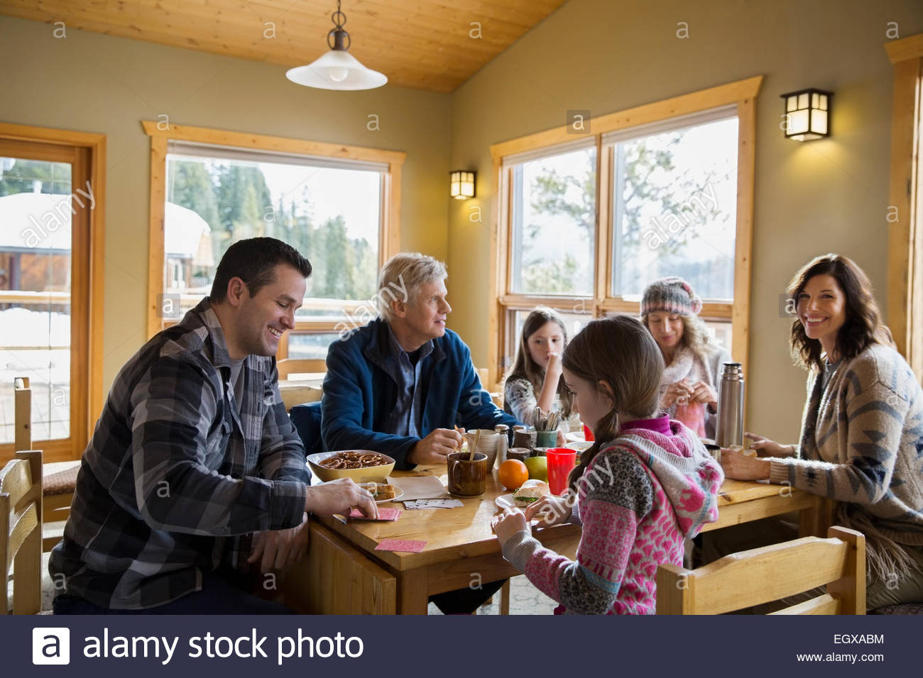 Men sitting around table hi-res stock photography and images - Alamy