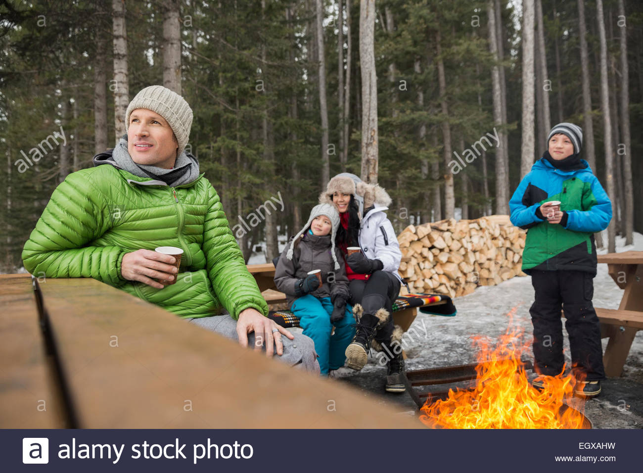 Sitting around fire pit hi-res stock photography and images - Alamy