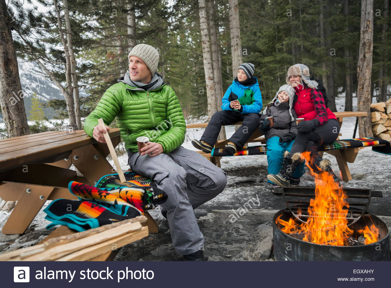 Sitting around fire pit hi-res stock photography and images - Alamy