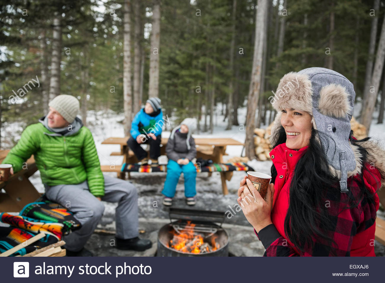 Sitting around fire pit hi-res stock photography and images - Alamy