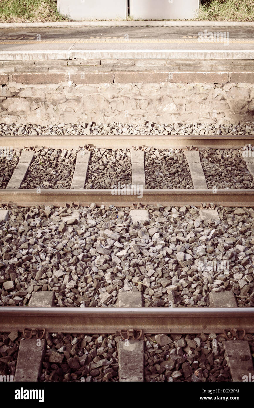 Train stop and train tracks Stock Photo - Alamy