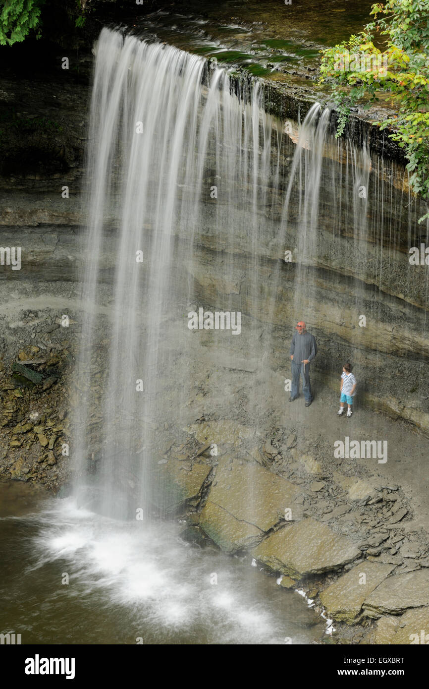 Visitors standing under Bridal Veil Falls Manitoulin Island- Kagawong ...