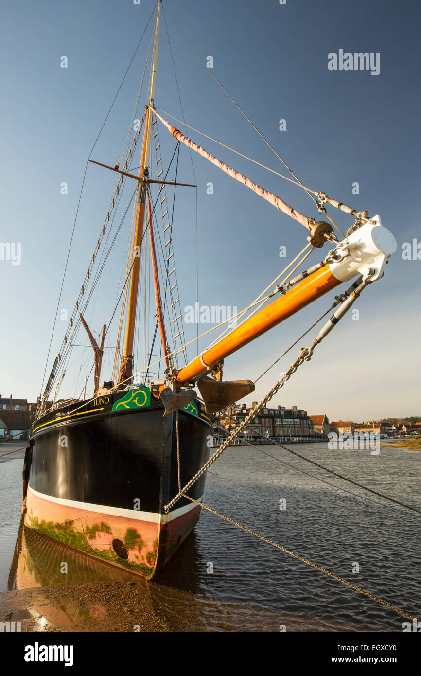 A traditional old wooden sailing boat in a tidal creek at Blakeney ...
