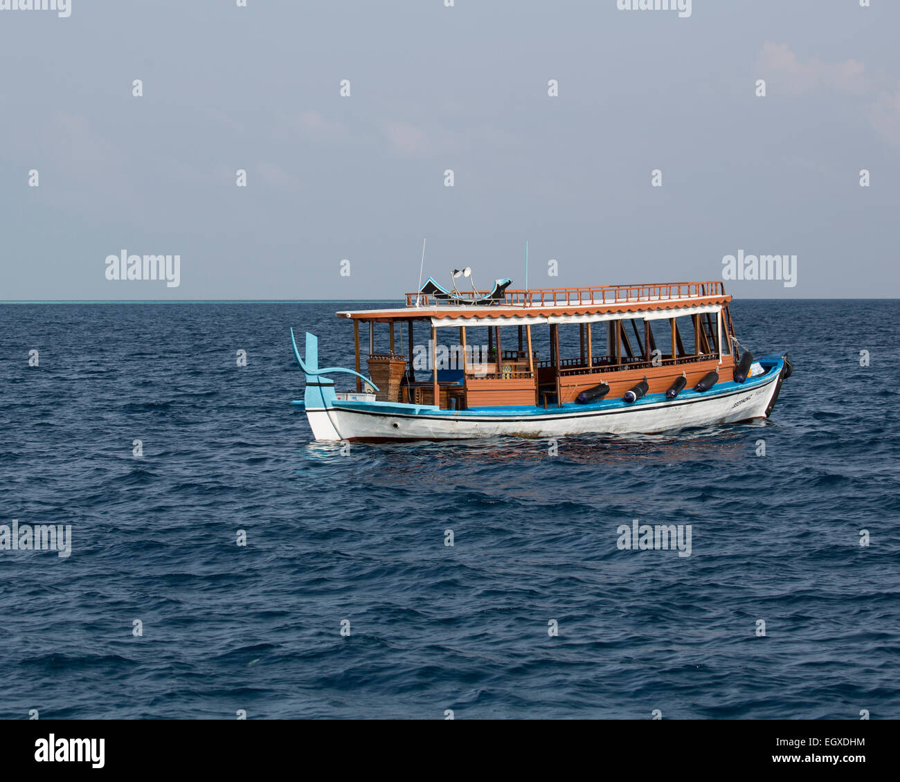 An inter-island ferry sits at a mooring in the Maldives Stock Photo - Alamy