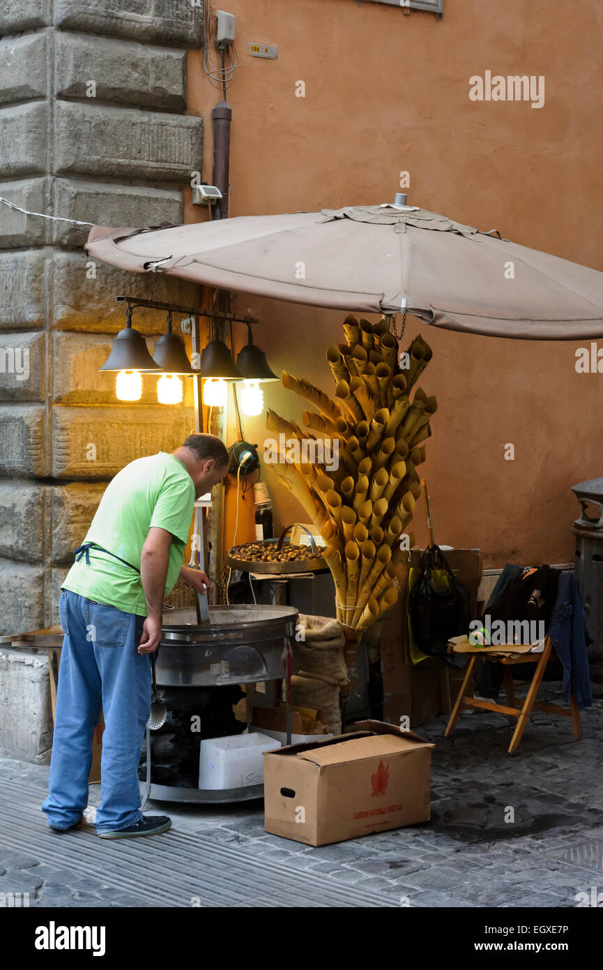 A street vendor roasting chestnuts on the grill, Rome, Italy Stock ...