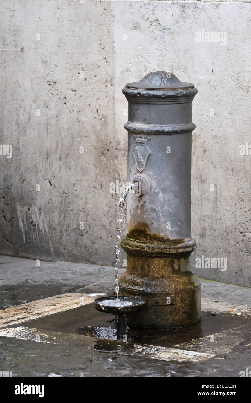 An old traditional water fountain in Rome, Italy Stock Photo - Alamy