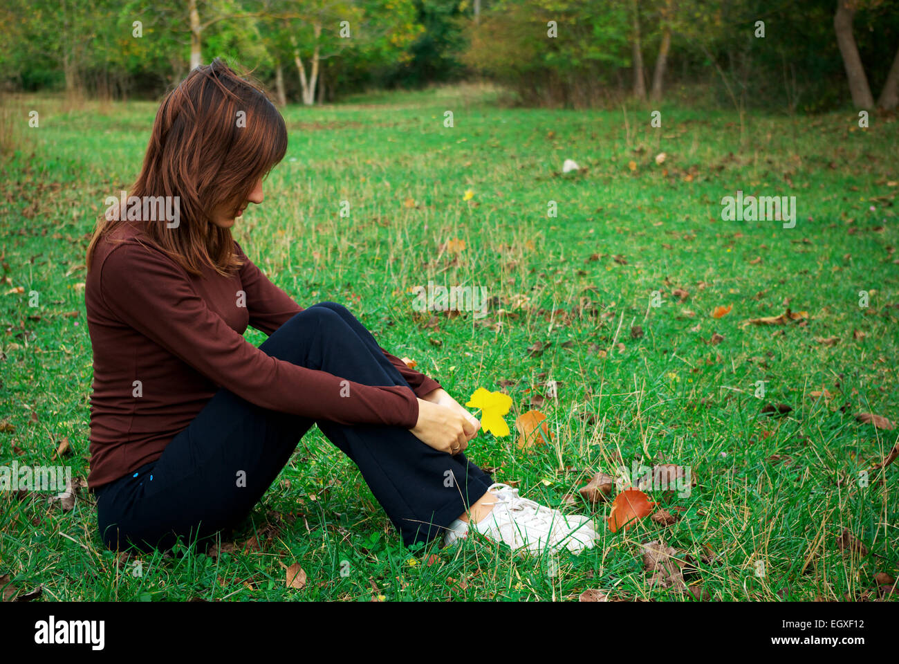 Girl in sadness. Emotional scene Stock Photo - Alamy