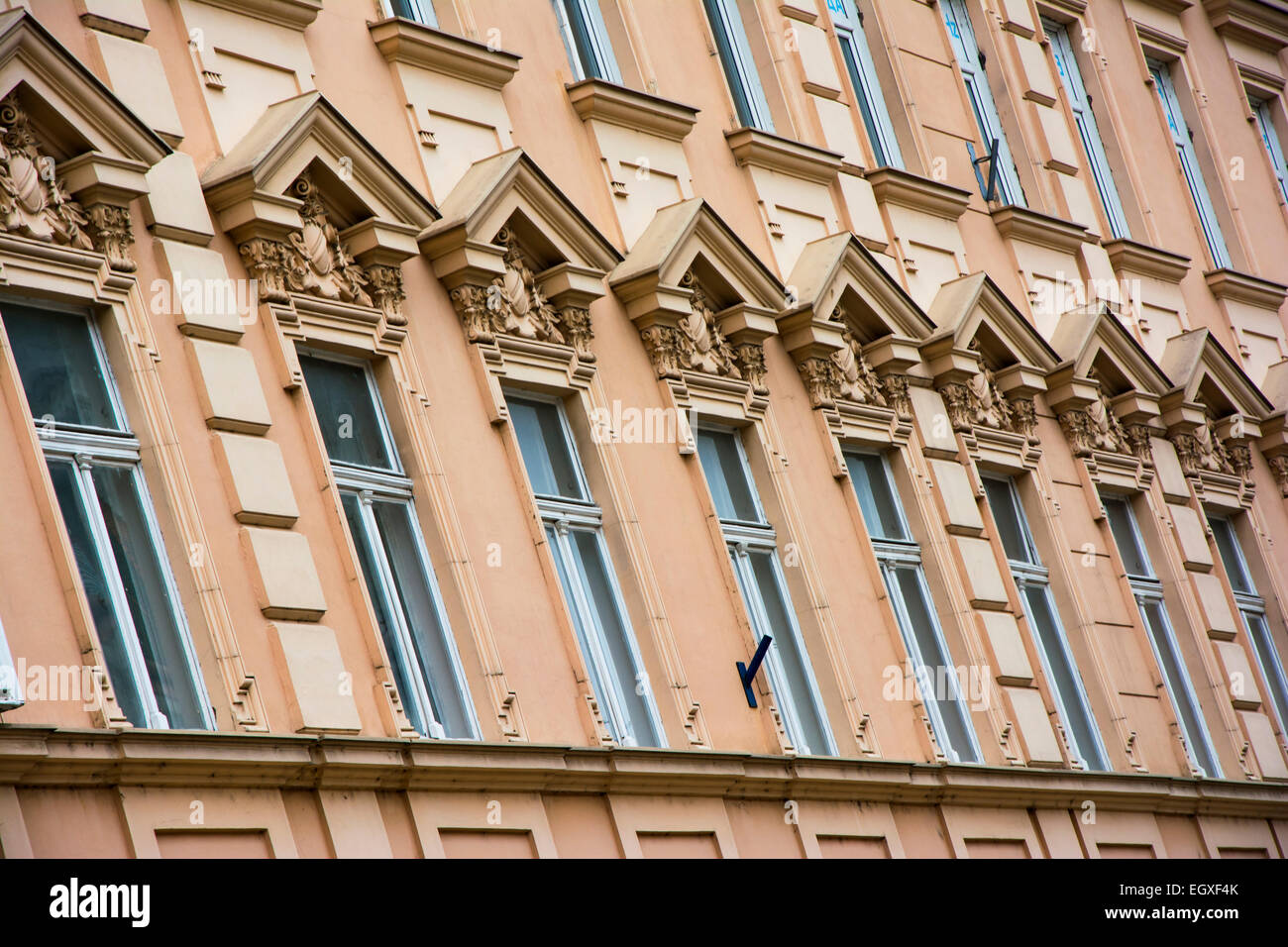 Old windows with nineteen century architecture on a house Stock Photo ...