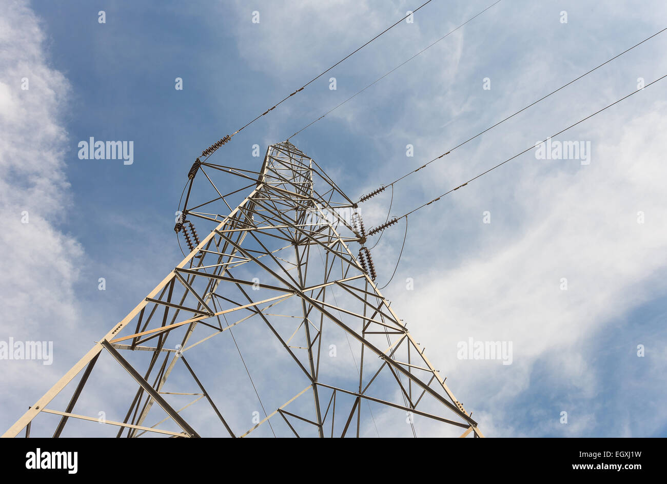 The transmission tower on blue sky background Stock Photo - Alamy
