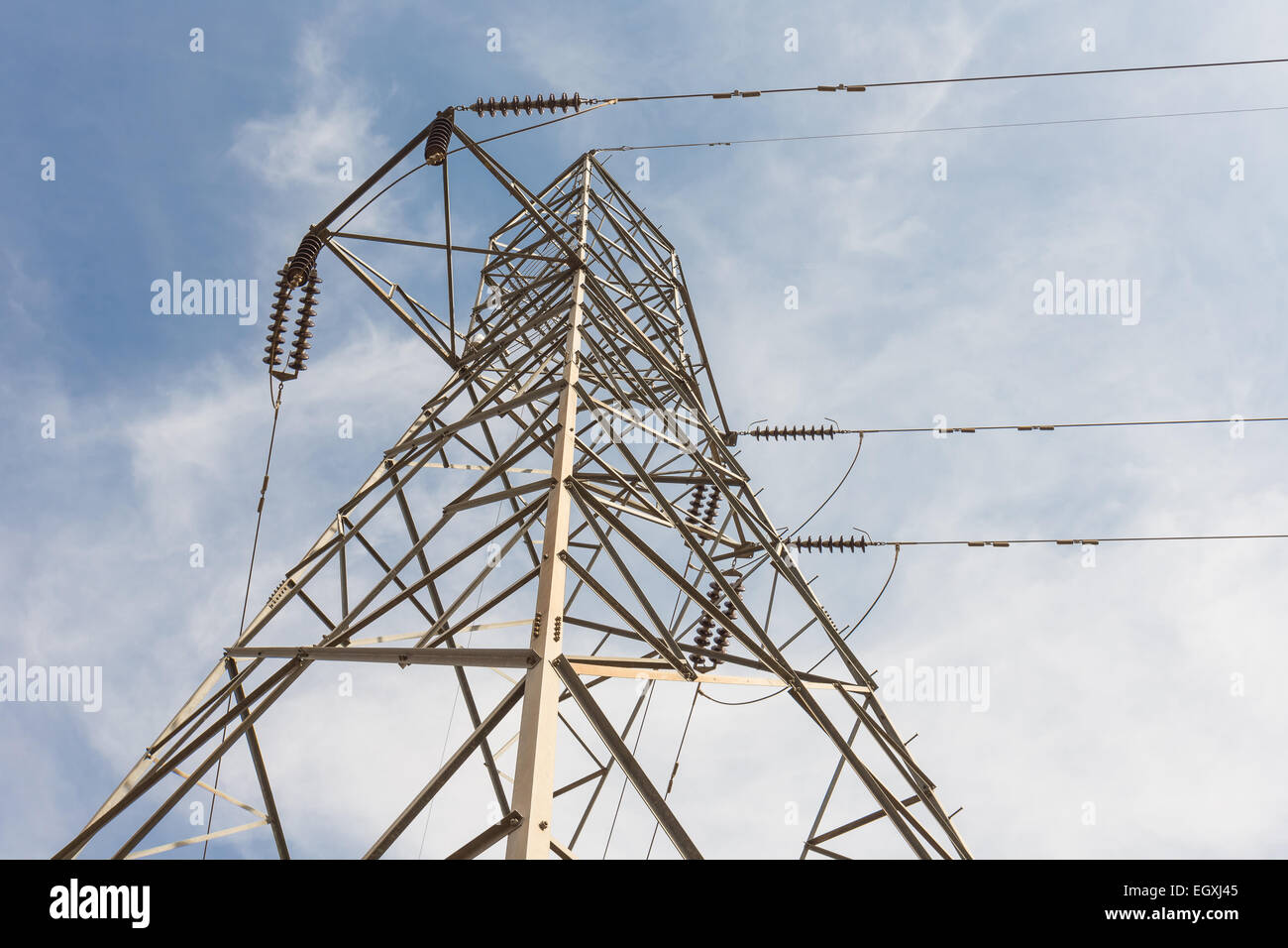 The transmission tower on blue sky background Stock Photo - Alamy