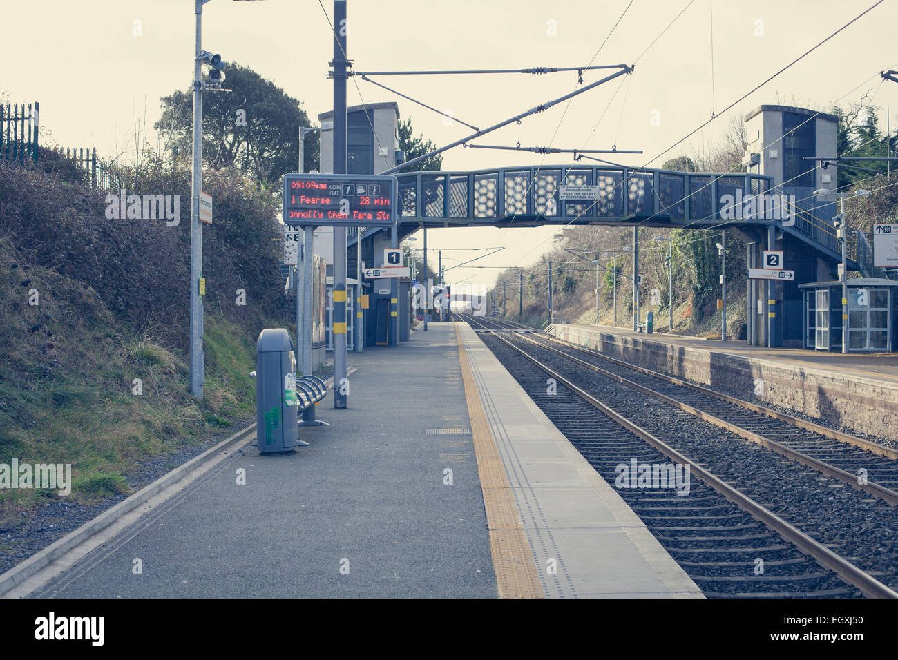 Train stop and train tracks Stock Photo - Alamy