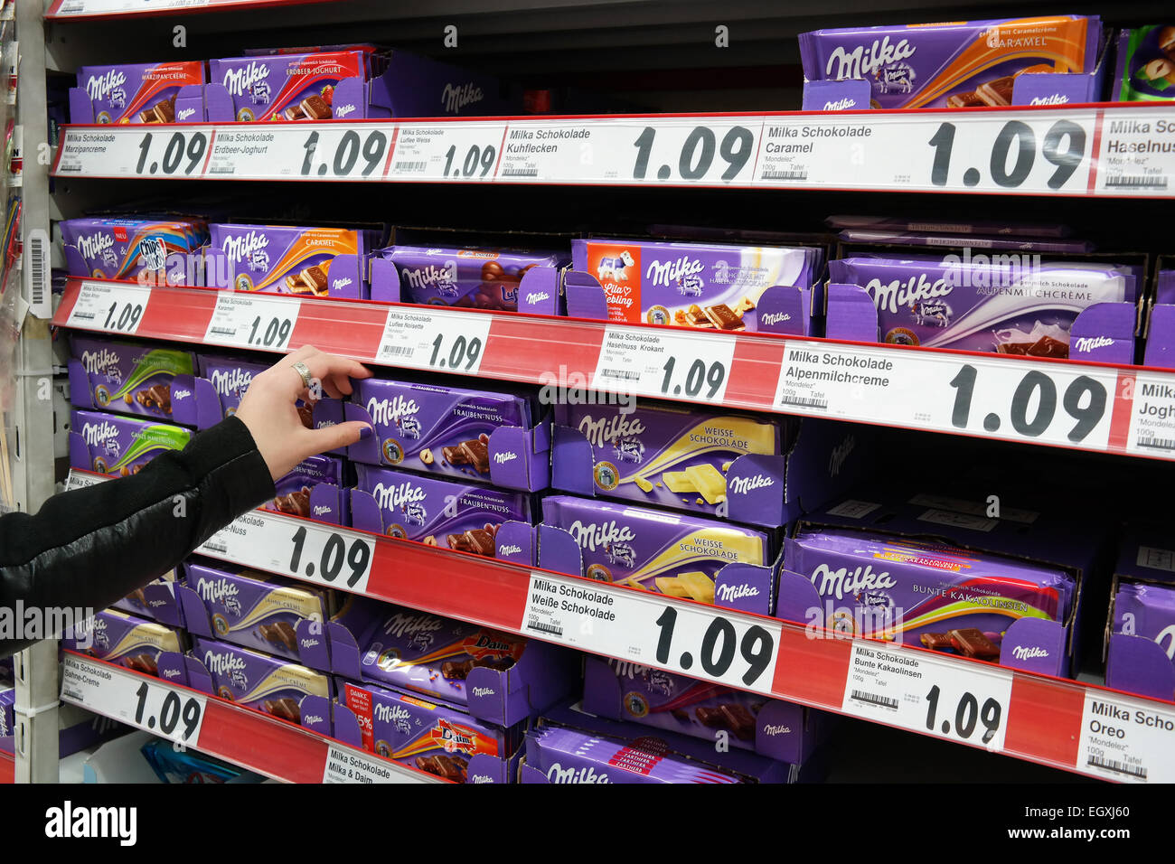 GERMANY - FEBRUARY 2015: Shelves with a variety of Milka chocolate bars ...