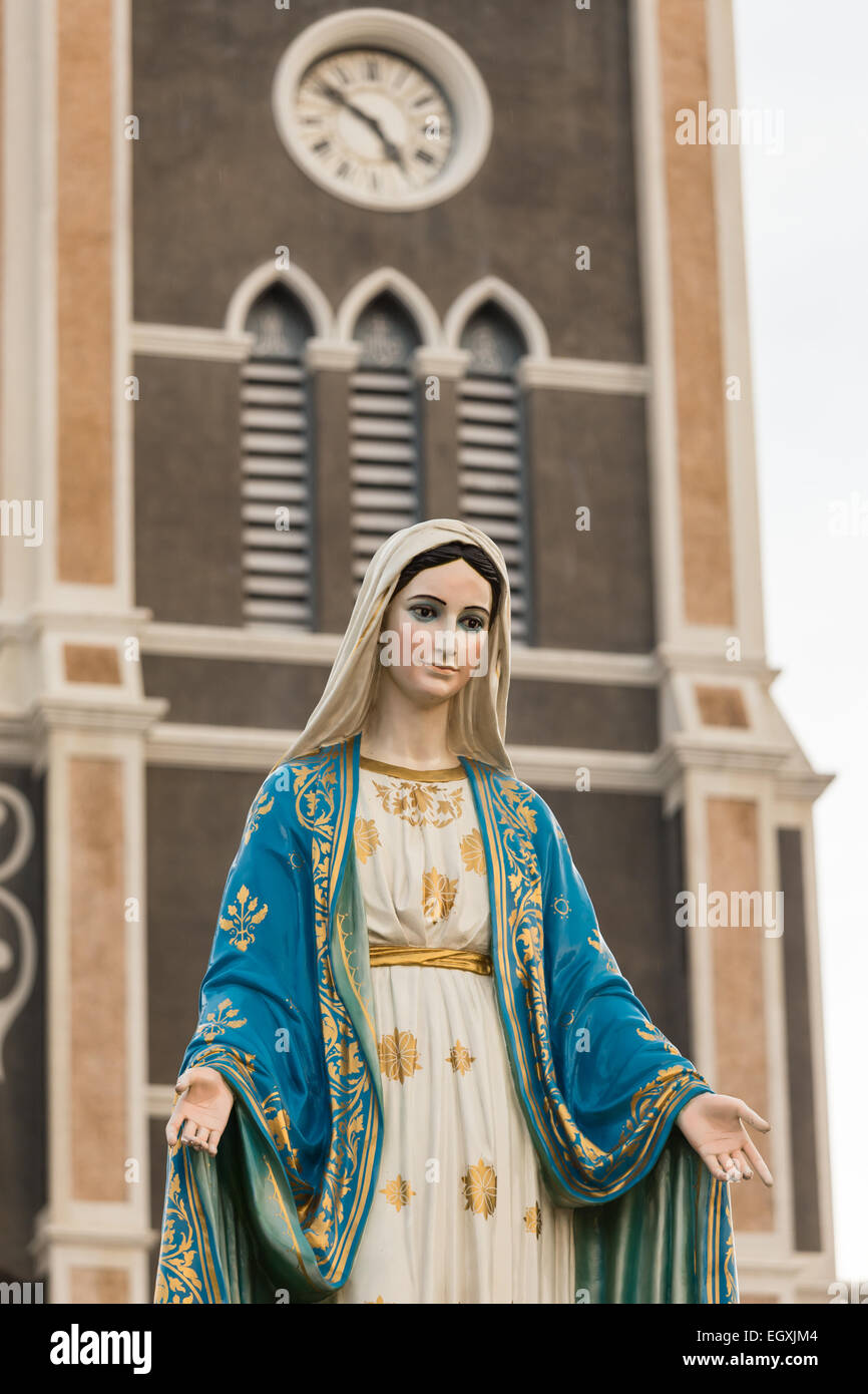 Saint Mary or the Blessed Virgin Mary, the mother of Jesus, in front of ...