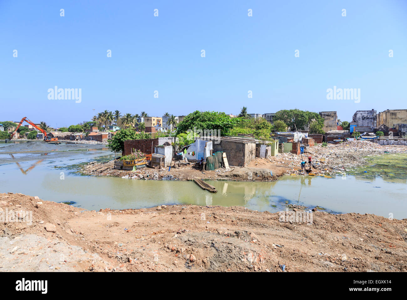 Third world poverty lifestyle: Local people sifting rubbish in slums on ...