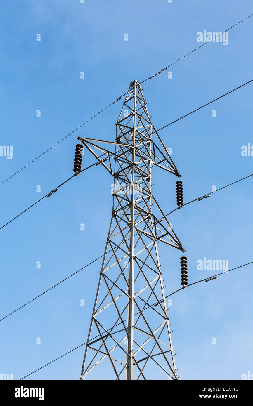 The transmission tower on blue sky background Stock Photo - Alamy