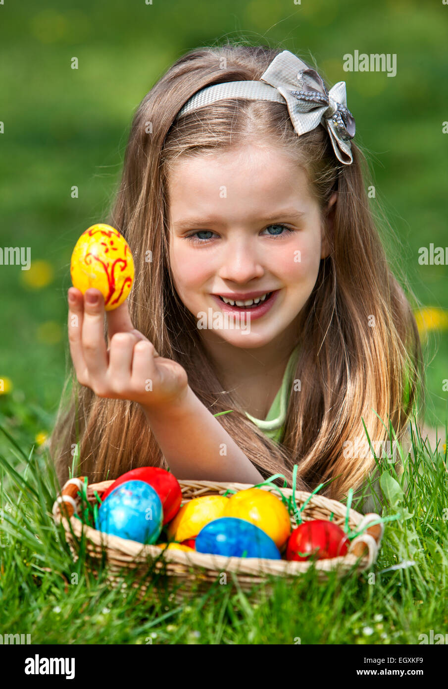 Child find easter egg outdoor Stock Photo - Alamy