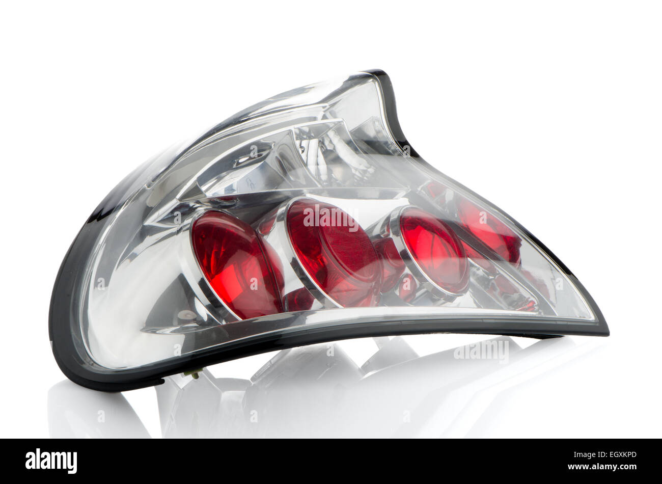 Rear automobile lamp detail on white reflective background Stock Photo ...