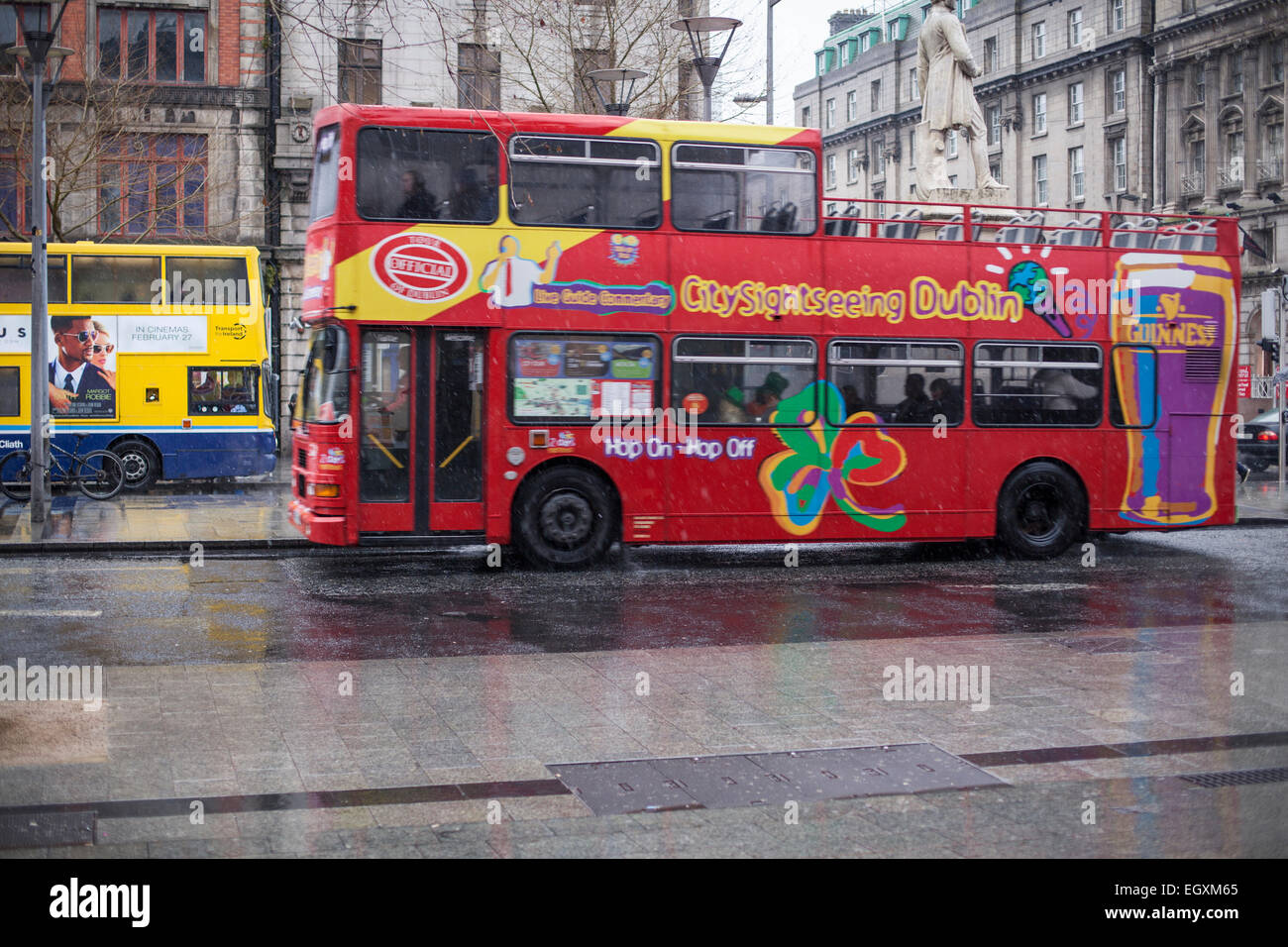 City Sightseeing bus on Dublin's O'Connell street in the rain on a ...