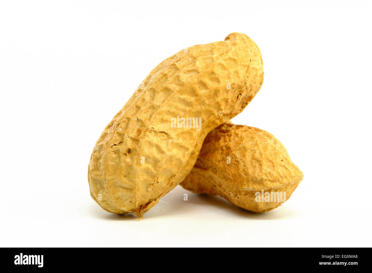 Peanuts on white Stock Photo - Alamy
