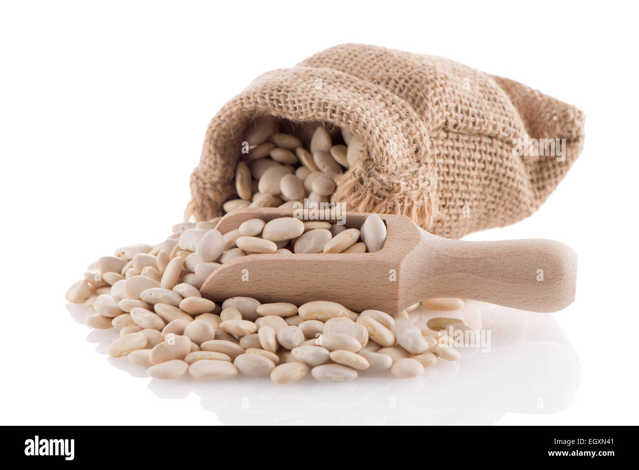 White beans bag with wooden scoop on white background Stock Photo - Alamy