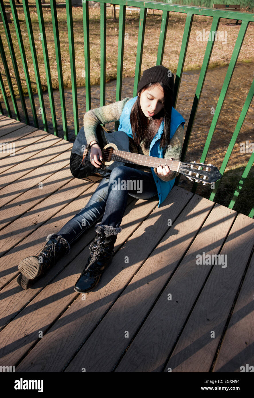 Guitar player playing song outdoor hi-res stock photography and images ...