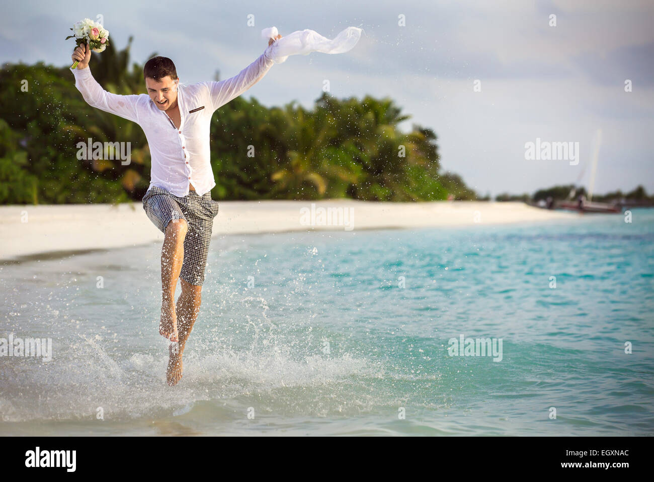 Groom jumping hi-res stock photography and images - Alamy