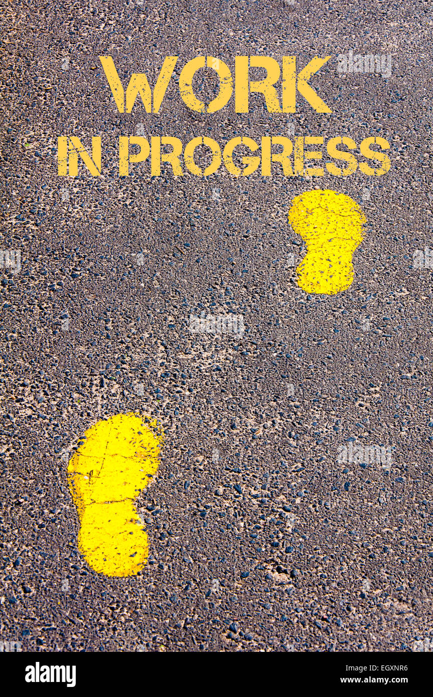 Yellow footsteps on sidewalk towards Work in Progress message ...