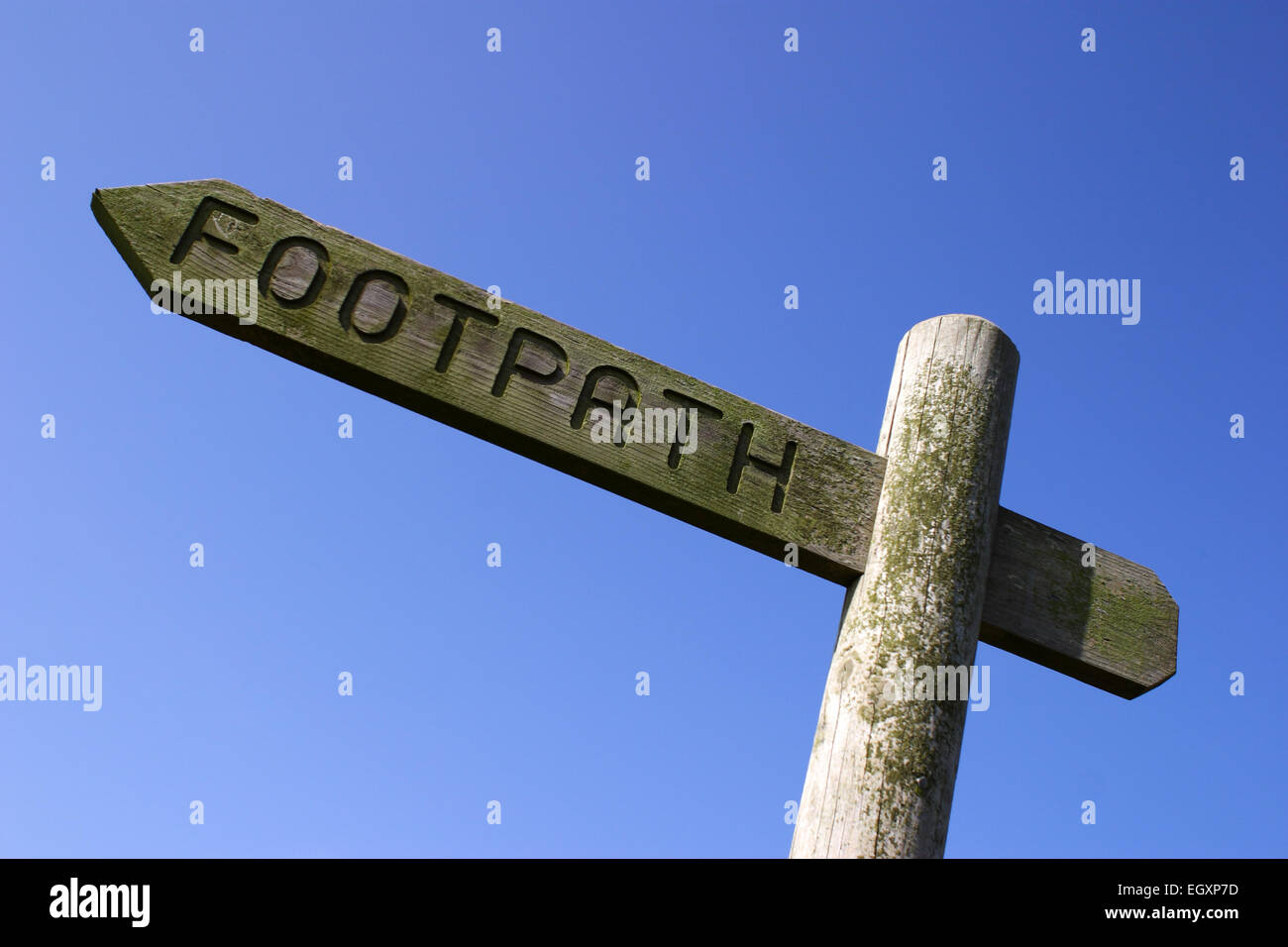 Footpath sign in summer sunshine on the coastal footpath under ...