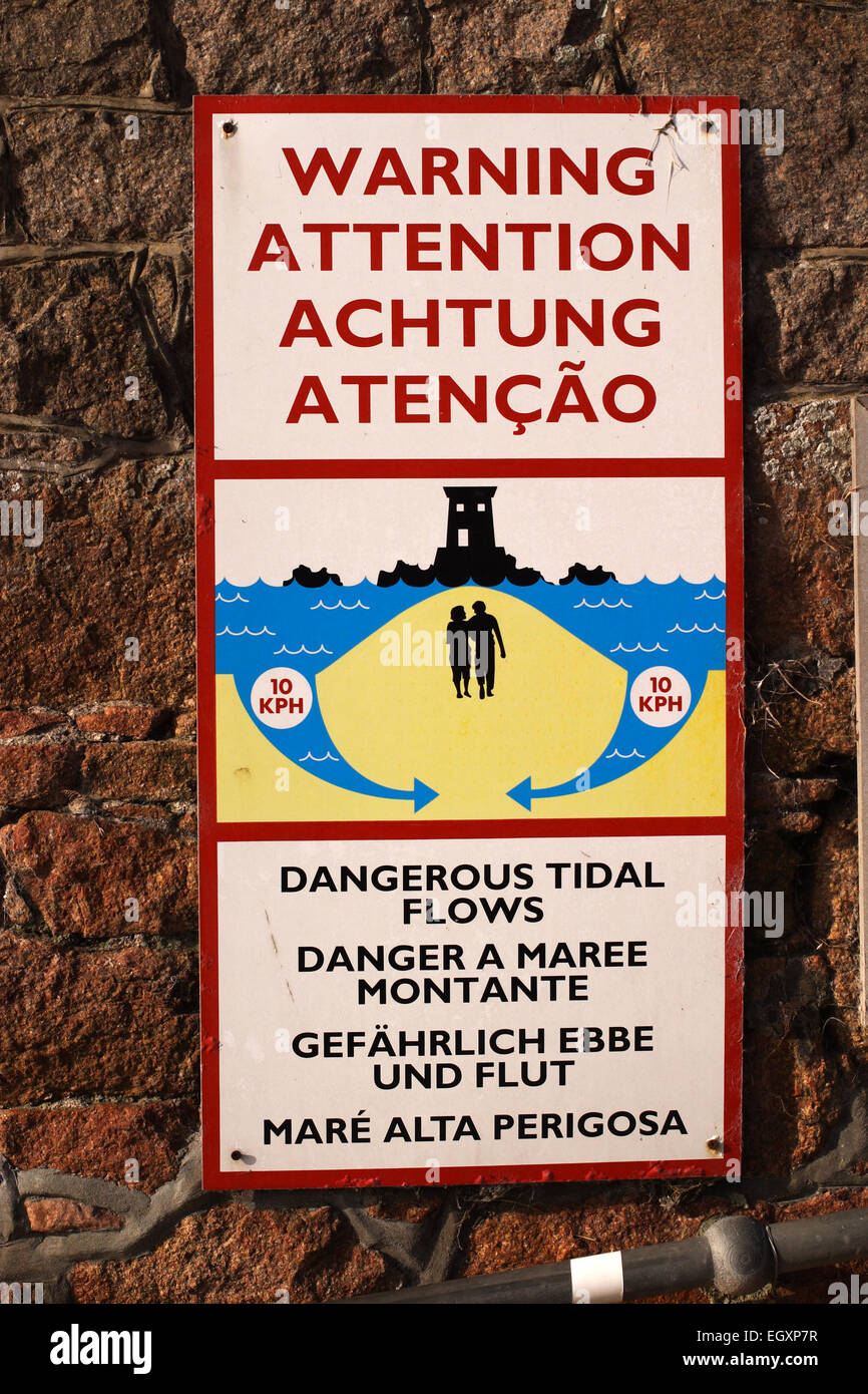 Sign warning of dangerous tidal currents, Jersey, UK Stock Photo - Alamy