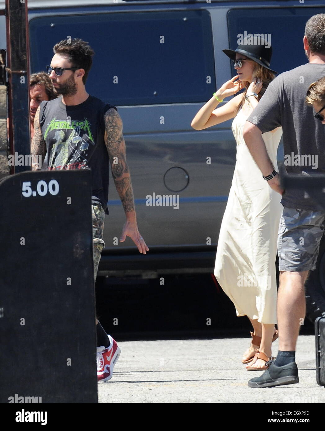 Newlyweds Adam Levine and Behati Prinsloo arrive on the set of Maroon 5 ...