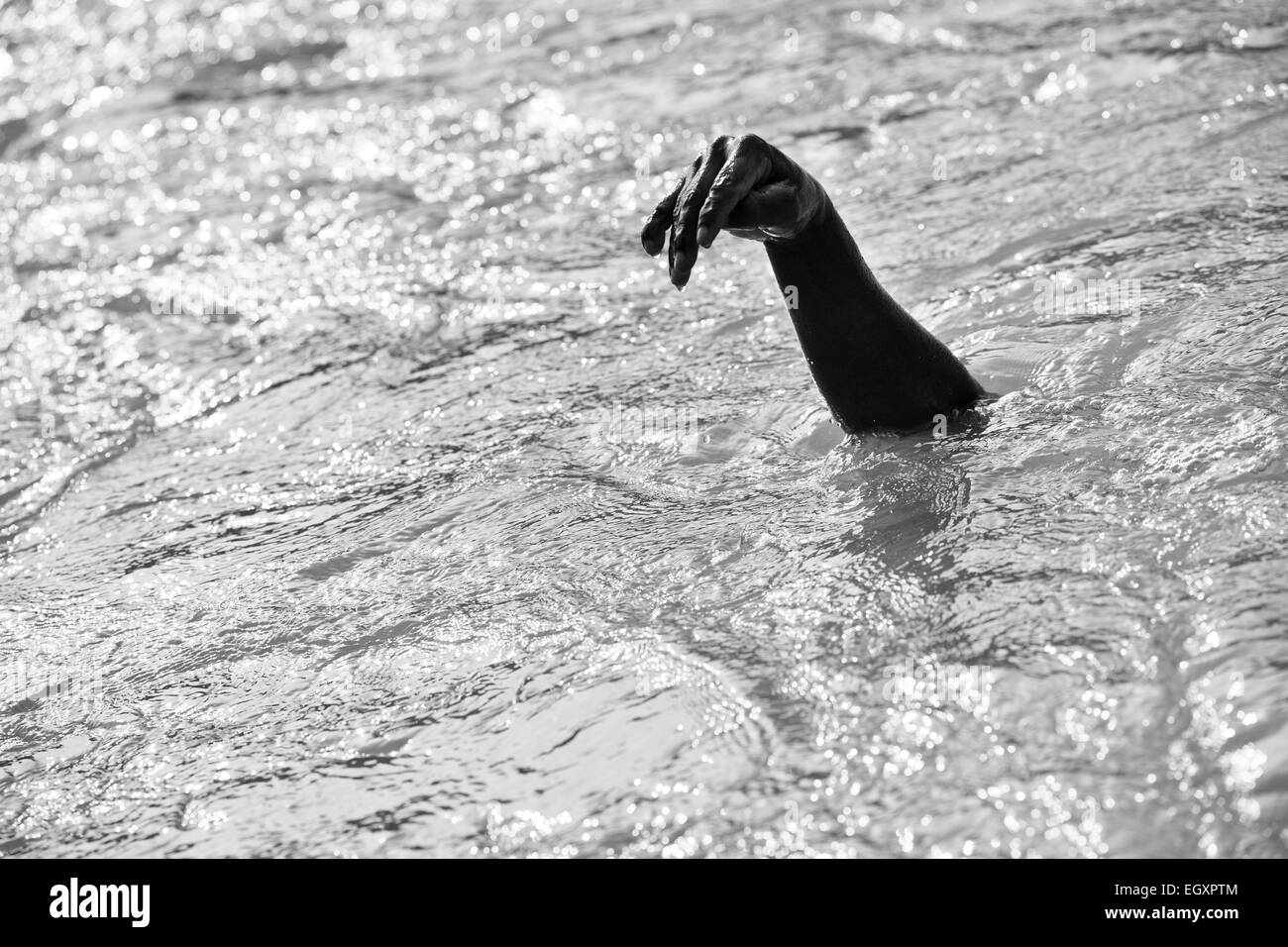 Sand in the hand Black and White Stock Photos & Images - Alamy