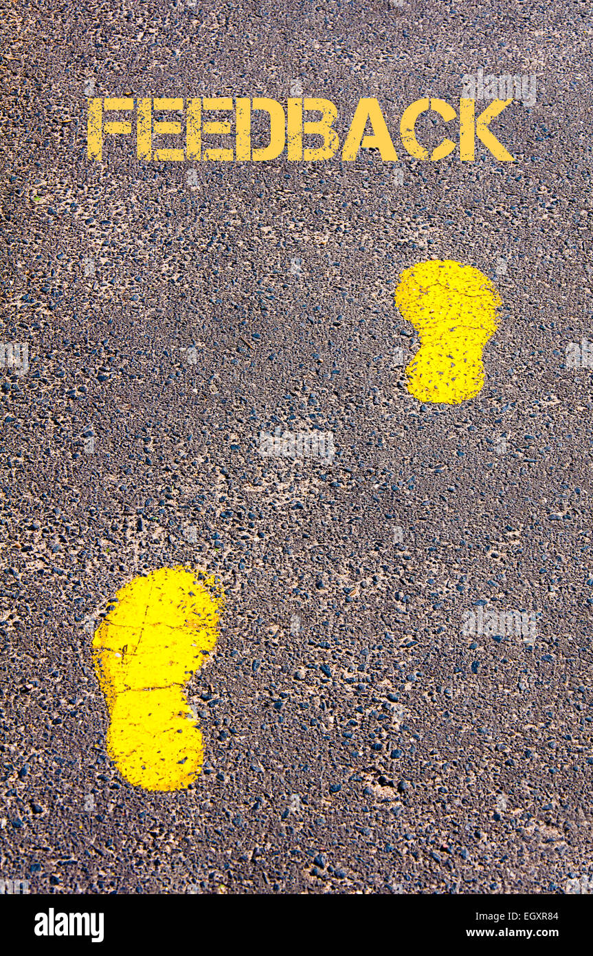 Yellow footsteps on sidewalk towards Feedback message.Conceptual image ...