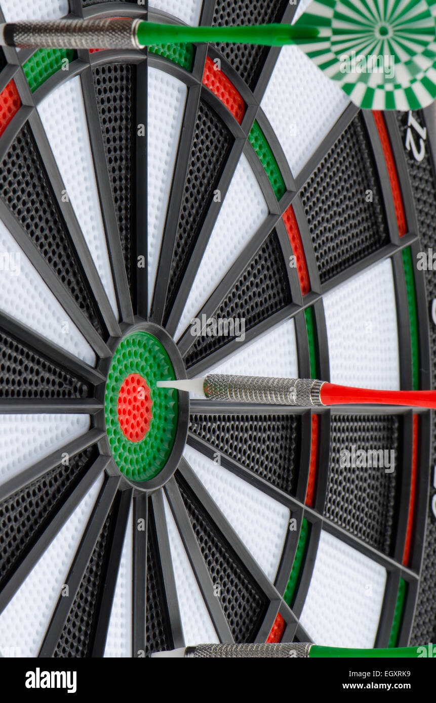 Closeup of dart board with darts Stock Photo - Alamy