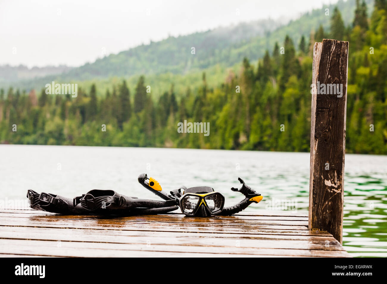 Snorkeling Mask and Tuba on Dock After a Dive Stock Photo - Alamy