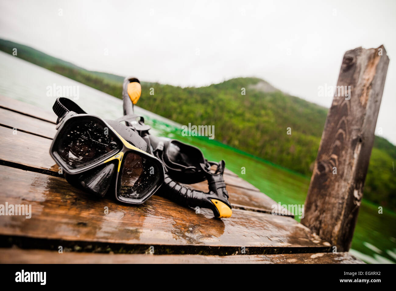 Snorkeling Mask and Tuba on Dock After a Dive Stock Photo - Alamy