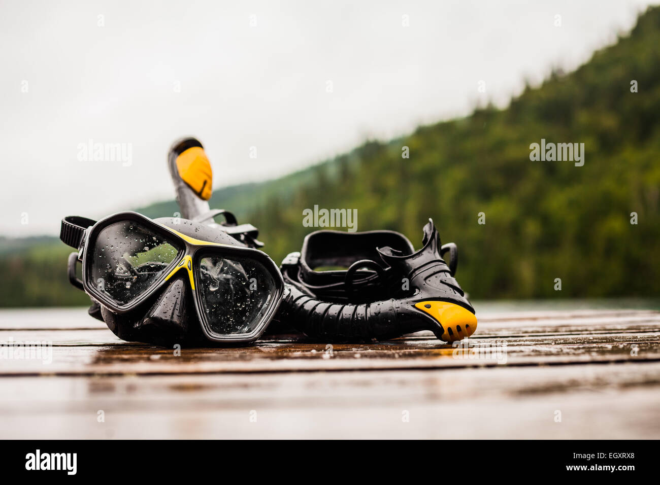 Snorkeling Mask and Tuba on Dock After a Dive Stock Photo - Alamy
