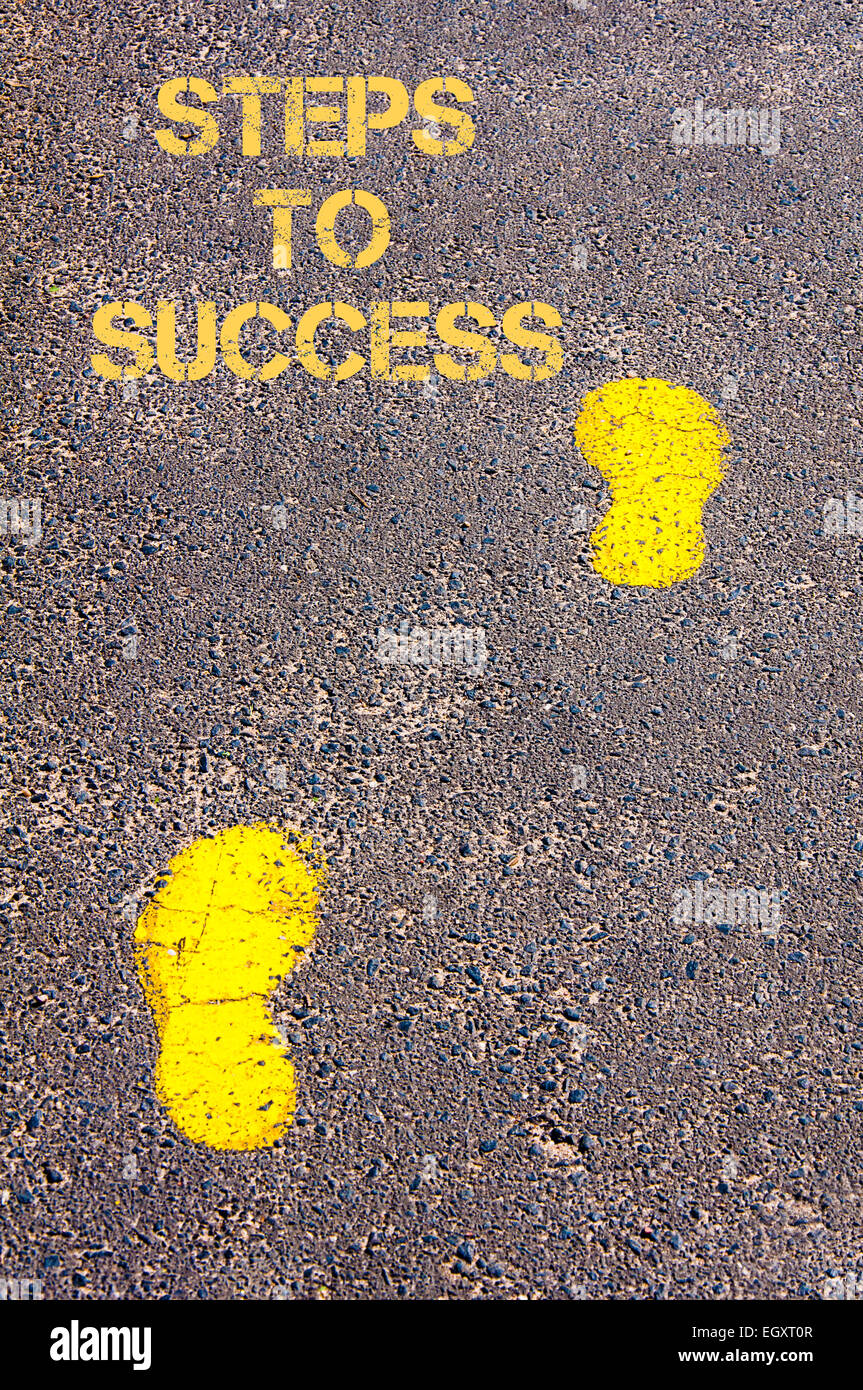 Yellow footsteps on sidewalk towards Steps to Success message.Concept ...