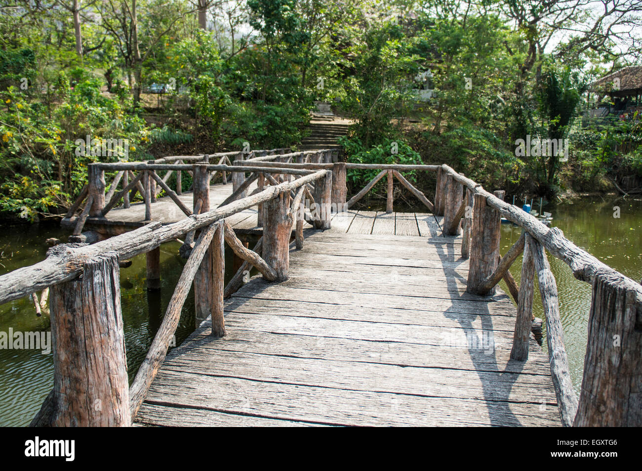 walkway path by the pond Stock Photo - Alamy