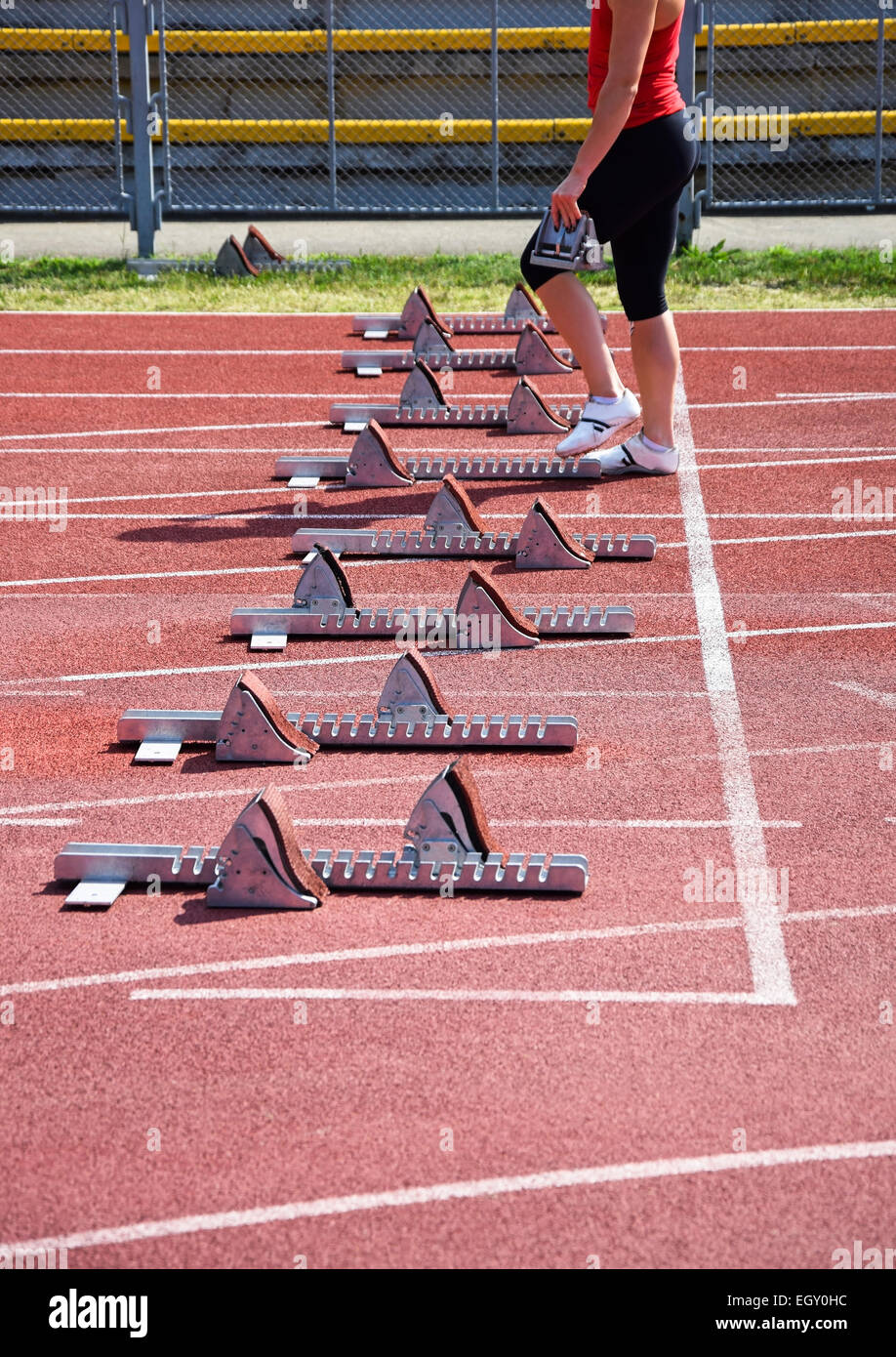 Starting machines on the running track Stock Photo - Alamy