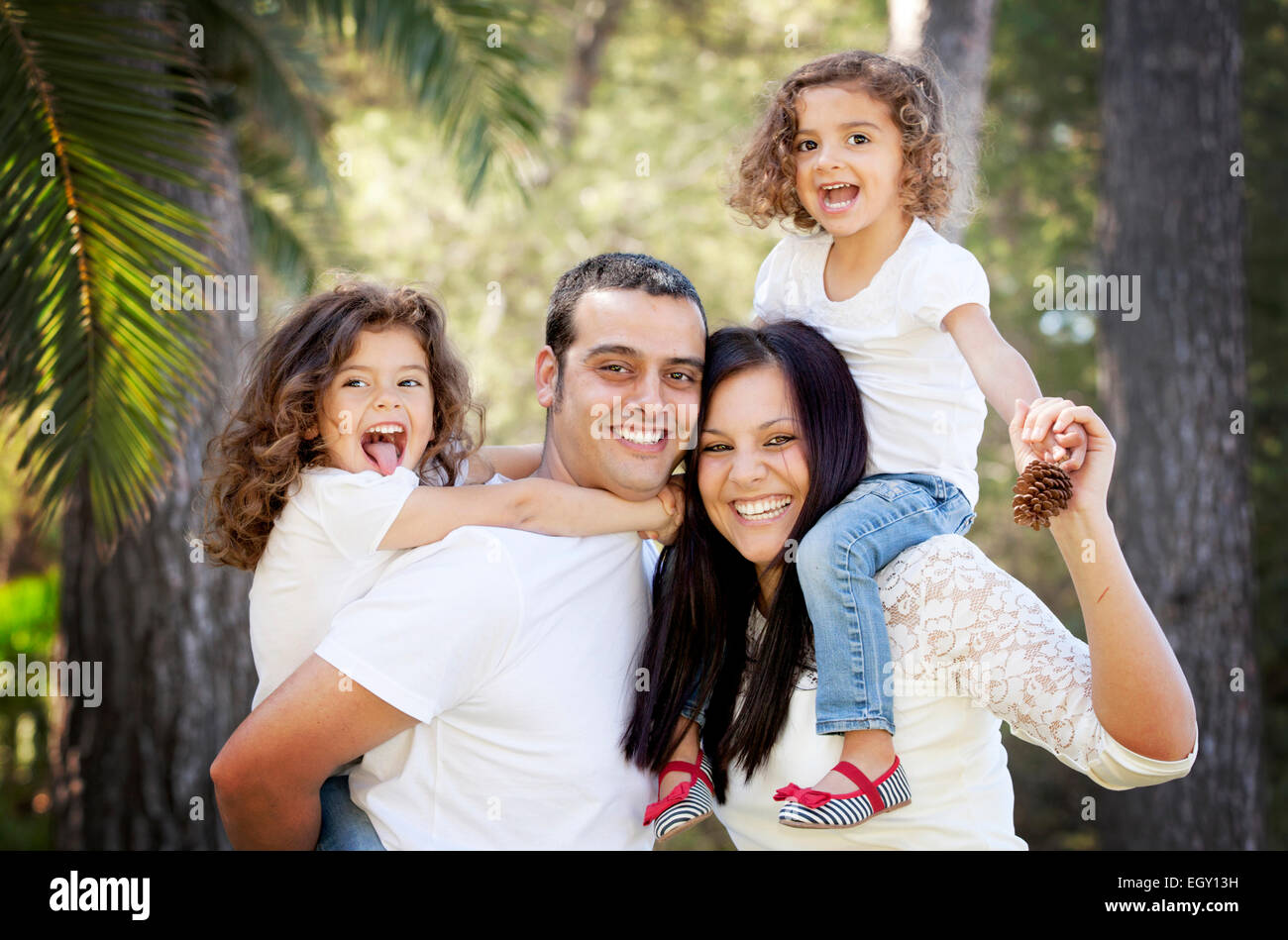 parents and children, happy smiling hispanic family Stock Photo - Alamy