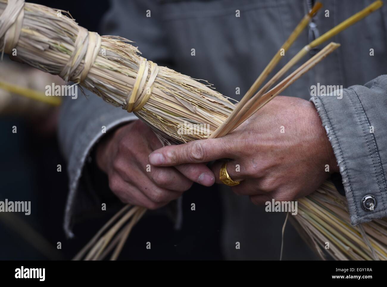 Chenzhou, China's Hunan Province. 3rd Mar, 2015. A villager weaves ...