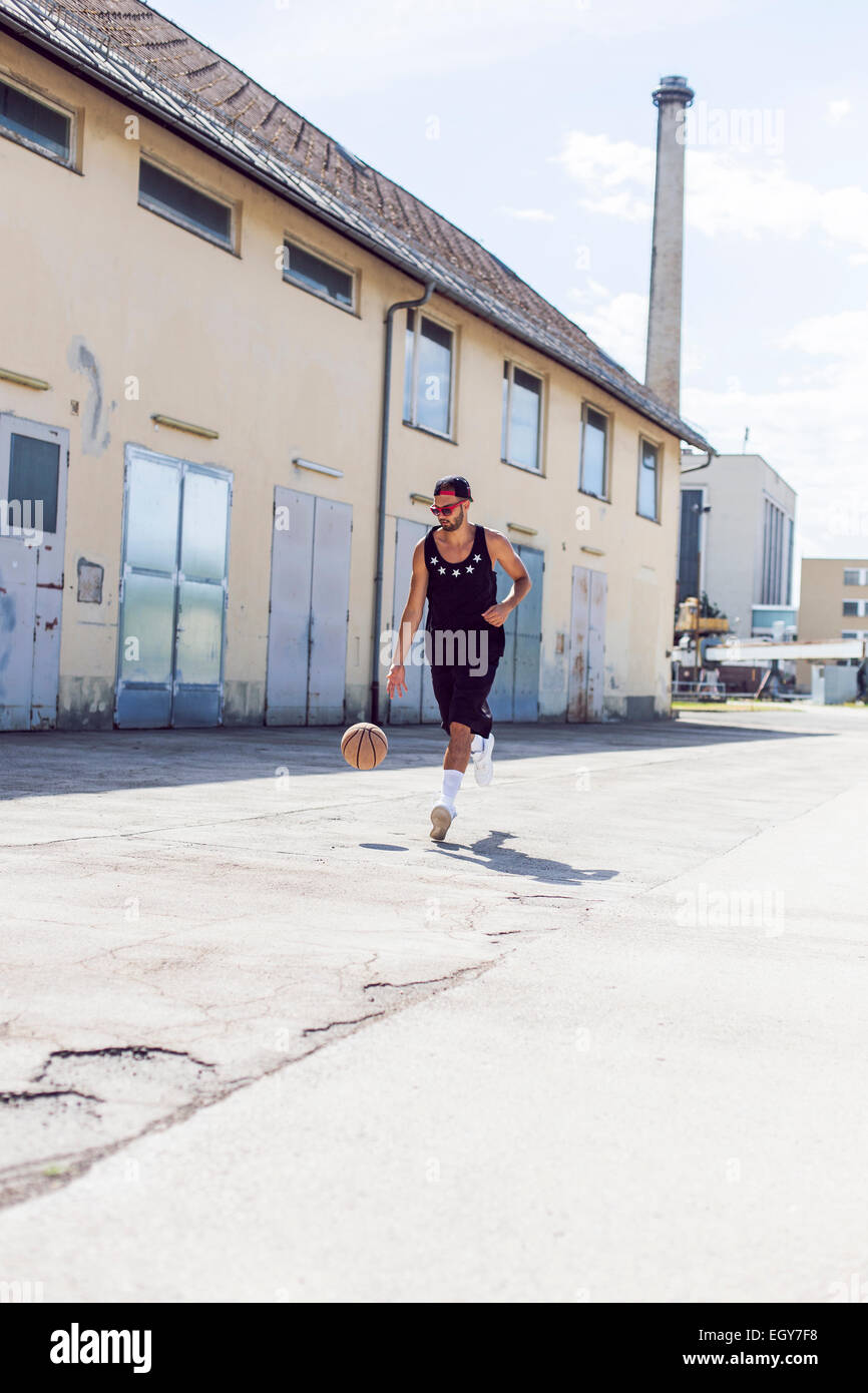 Man running basketball hi-res stock photography and images - Alamy