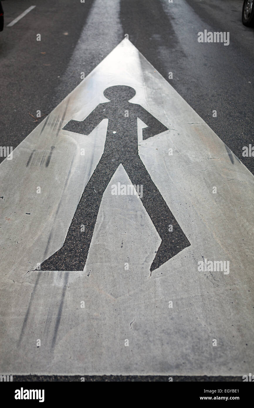 Walking sign, diminishing perspective Stock Photo - Alamy