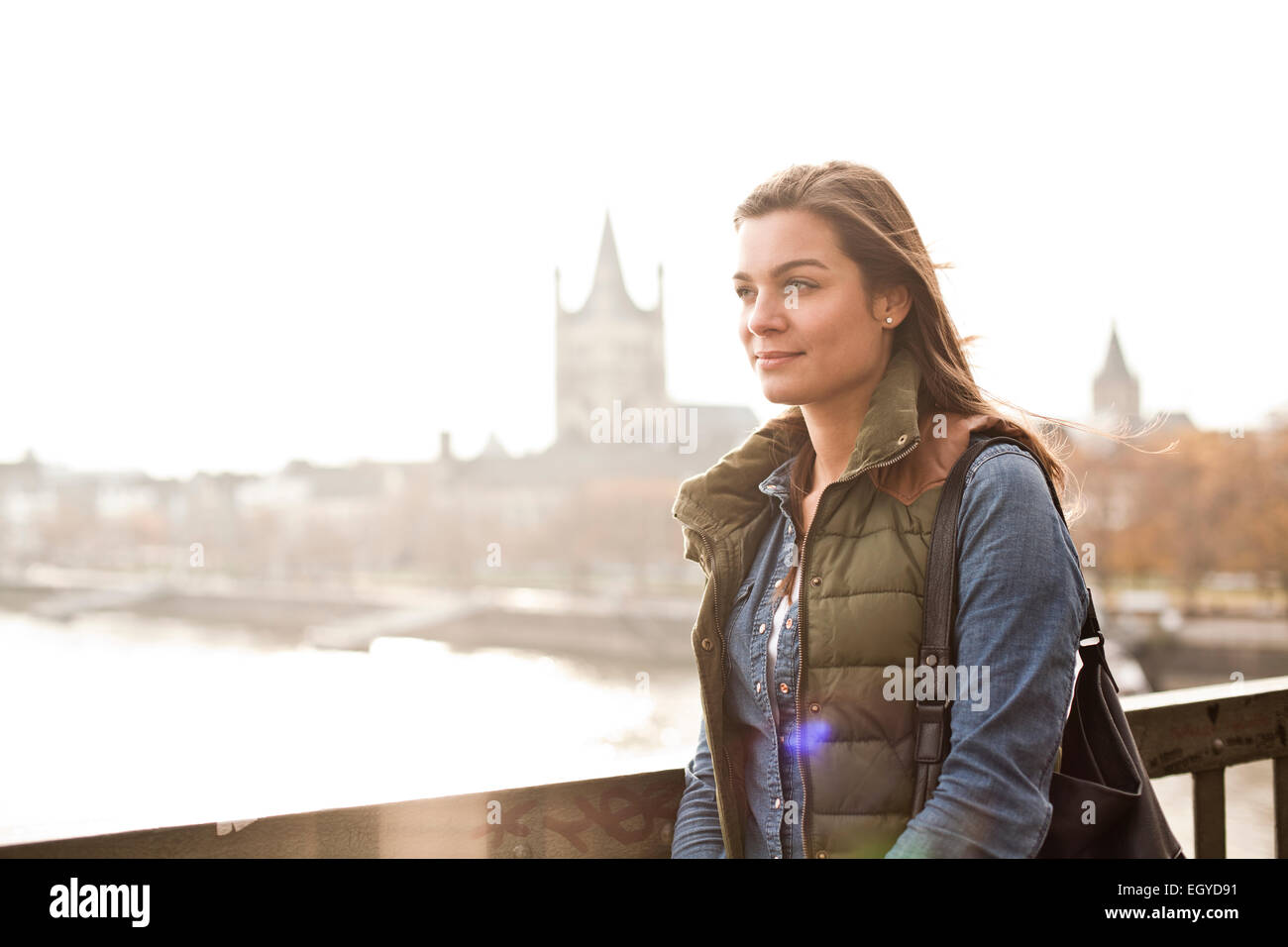 Germany, Cologne, young woman on Hohenzollern Bridge Stock Photo - Alamy