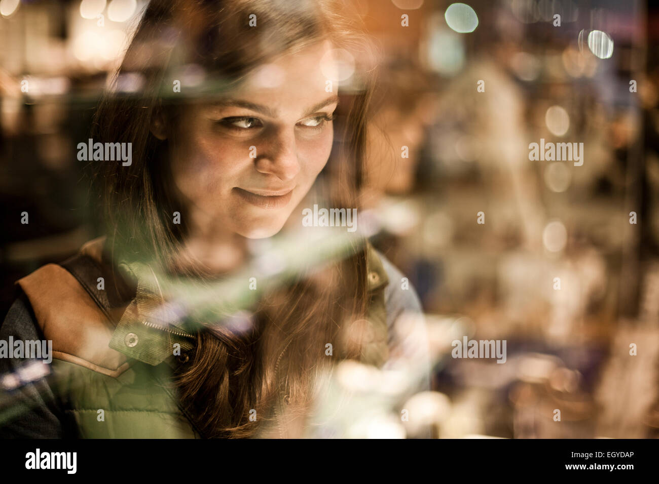 Germany, Cologne, young couple looking at window display Stock Photo ...