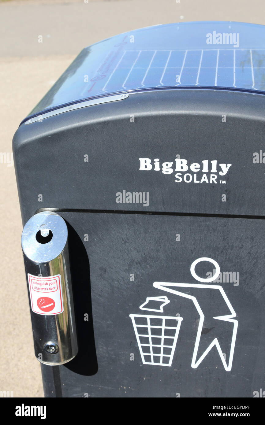 Solar powered waste bin which periodically compresses its contents so ...