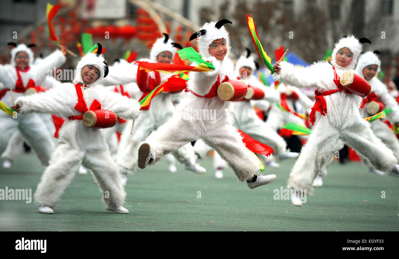 Yan'an. 4th Mar, 2015. Children perform waist drum dance during a ...