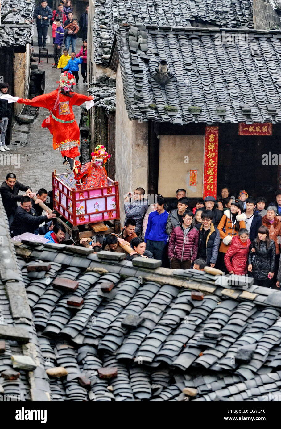 Longyan, China's Fujian Province. 4th Mar, 2015. Villagers take part in ...